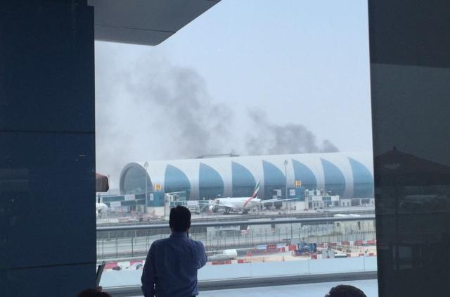 In pics: How 300 people escaped a crash-landed Emirates flight at Dubai ...