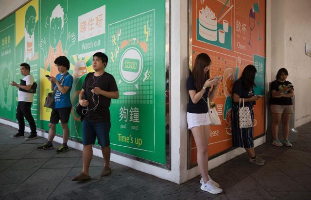 In pics: Hundreds on streets to catch Pokemons in Hong Kong’s first ...