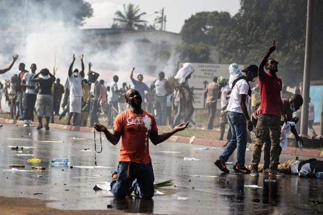 Forces storm opposition HQ as Gabon Parliament set ablaze by protesters ...