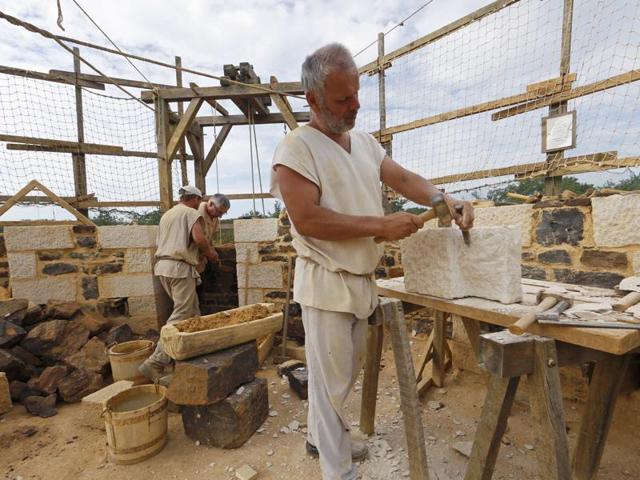 Builders go back in time to construct castle the good, old medieval way ...