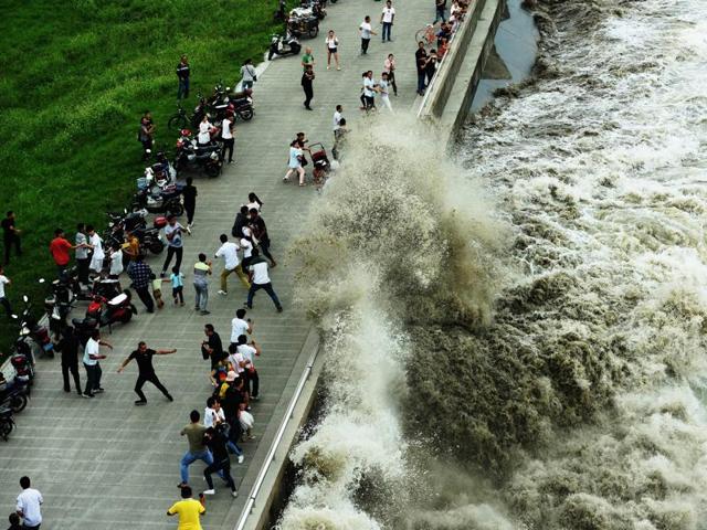 Death toll in China landslides after typhoon hits 16 as rescue efforts ...