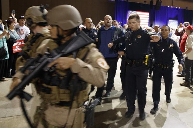 Trump rushed off stage by security officers after gun scare at Nevada ...