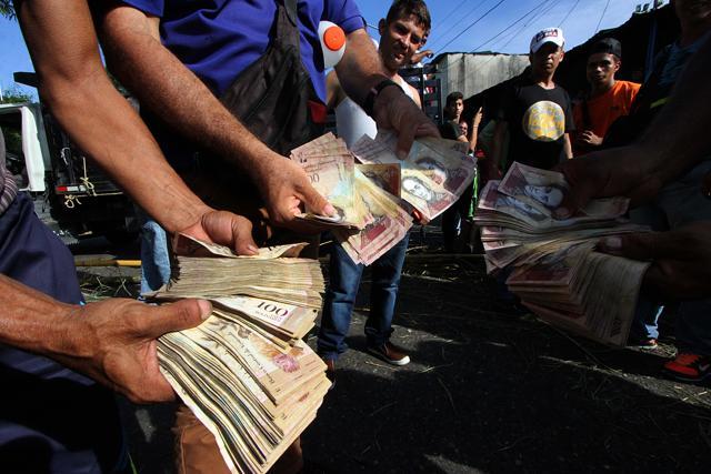 Protests, looting in Venezuela as most-used banknote is demonetised ...