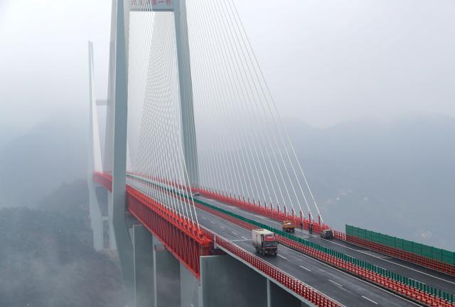 A road through the clouds: World’s highest bridge opens in China ...