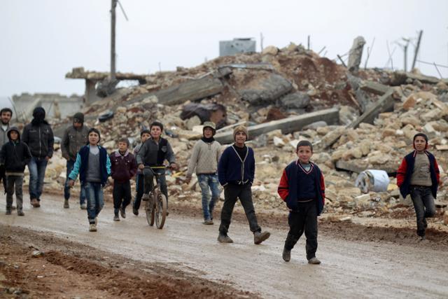 ‘It’s beyond imagination’: Thousands return to ruins of freezing Aleppo ...