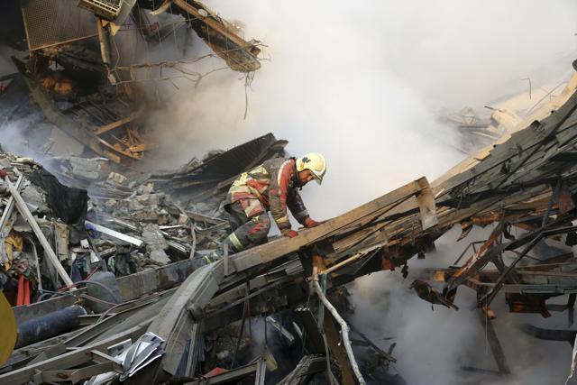 More than 20 firefighters dead in Tehran high-rise collapse: Mayor ...
