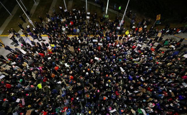 In pics: US airports become scene of anguish after Trump’s Muslim ...