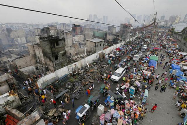 In pics | 15,000 residents lose homes as fire rages through Manila ...