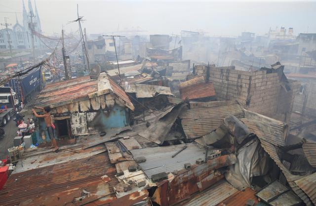 In pics | 15,000 residents lose homes as fire rages through Manila ...