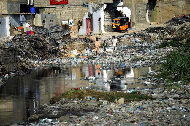 Karachi, a megacity of towering high-rises, now battles garbage problem ...