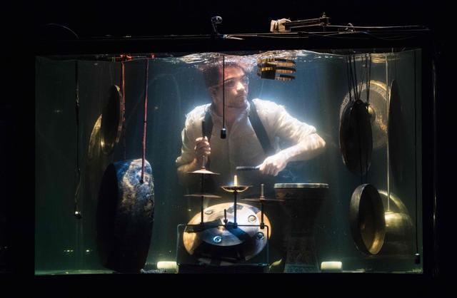 This Danish band performs while submerged in water tanks, like fish in ...