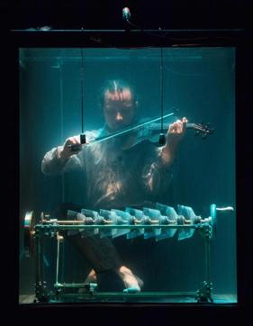 This Danish band performs while submerged in water tanks, like fish in ...