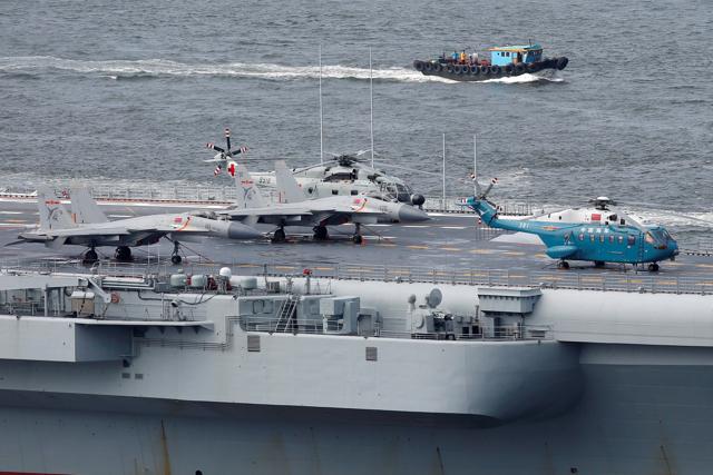 In Pics: China’s aircraft carrier visits Hong Kong in show of strength ...