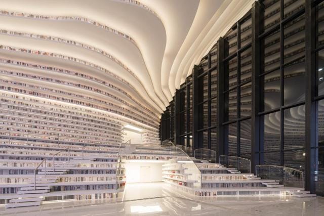 This six-storey futuristic library in China has shelves stacked with ...