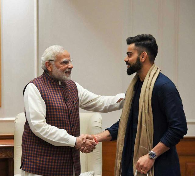 Newly wed Virat Kohli, Anushka Sharma meet PM Narendra Modi. See ...
