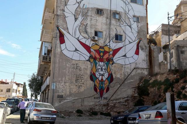 A group of graffiti artists in Jordan is adding colour to drab streets ...