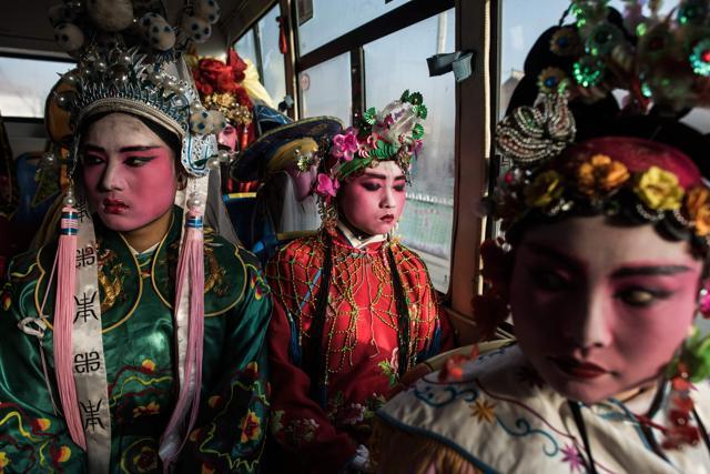 Chinese villagers don robes, make-up and wield swords to celebrate ...