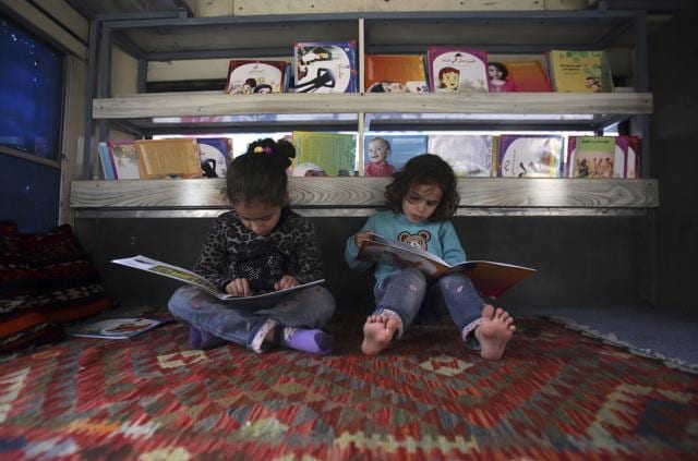 All aboard: Blue bus of Kabul brings joys of reading to Afghan children ...