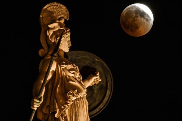 ‘Blood moon’ dazzles skygazers across the world in century’s longest ...