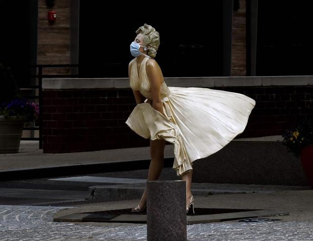 Smiling behind the mask: Facial covering symbolise our relentless fight ...