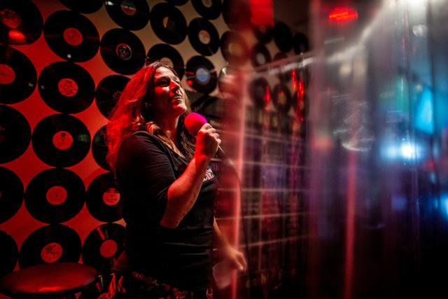 Canadian karaoke bar installs special stalls so customers sing in ...