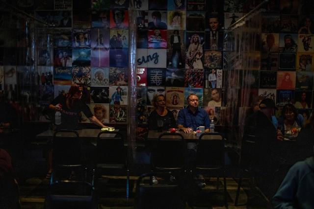Canadian karaoke bar installs special stalls so customers sing in ...