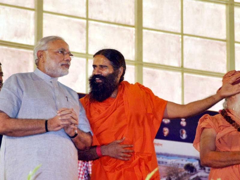 Modi plays sadhu charmer, teams up with Ramdev | Latest News India