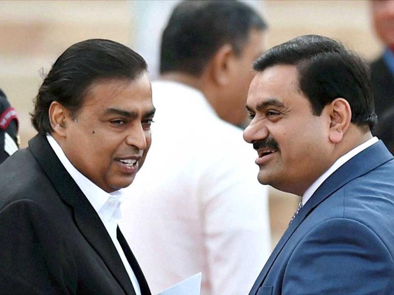 One year of Modi govt: Ambanis down in stock market, Adani up ...