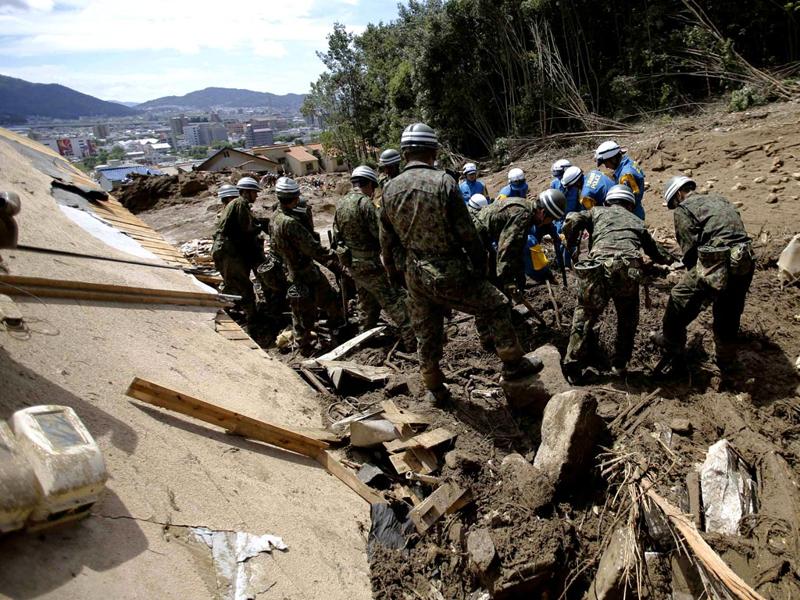 Rescuers comb through devastation of Japan landslide | World News