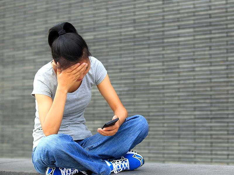 Using your phone too much may be hurting your back | Health