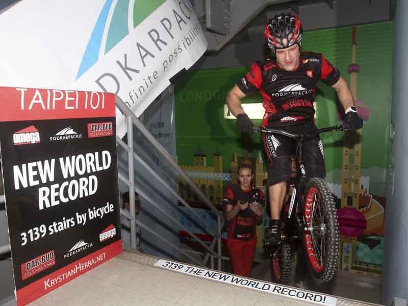 Watch: Cyclist sets new world record, climbs 3139 stairs in Taipei ...