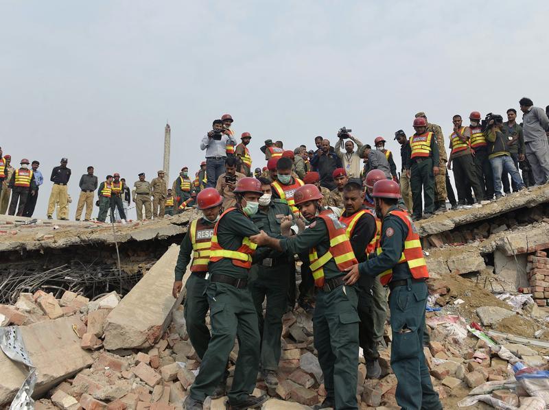99 rescued but ‘dozens’ feared trapped in Pakistan factory collapse ...