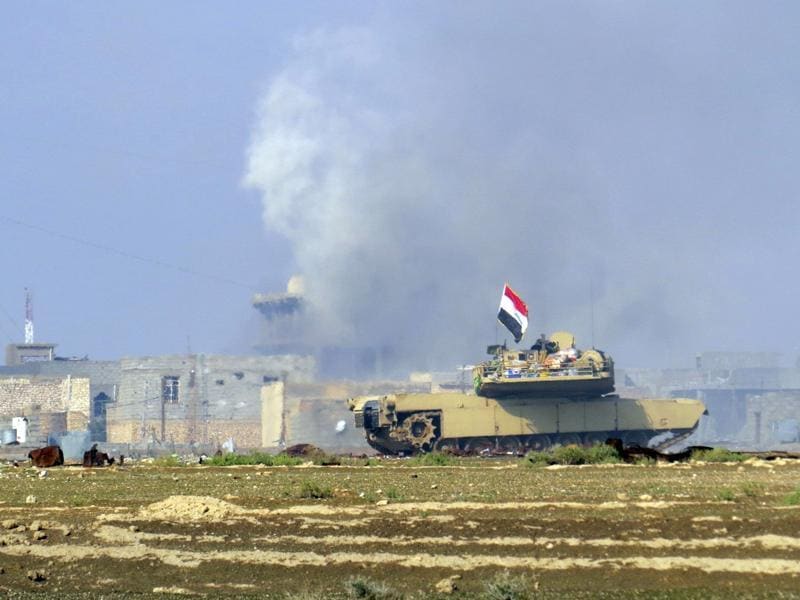 Iraqi forces retake key bridge, cut last IS supply line to Ramadi ...