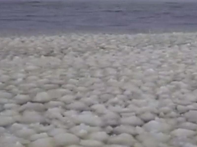 Watch | Weather phenomenon forms hundreds of snowballs in lake ...