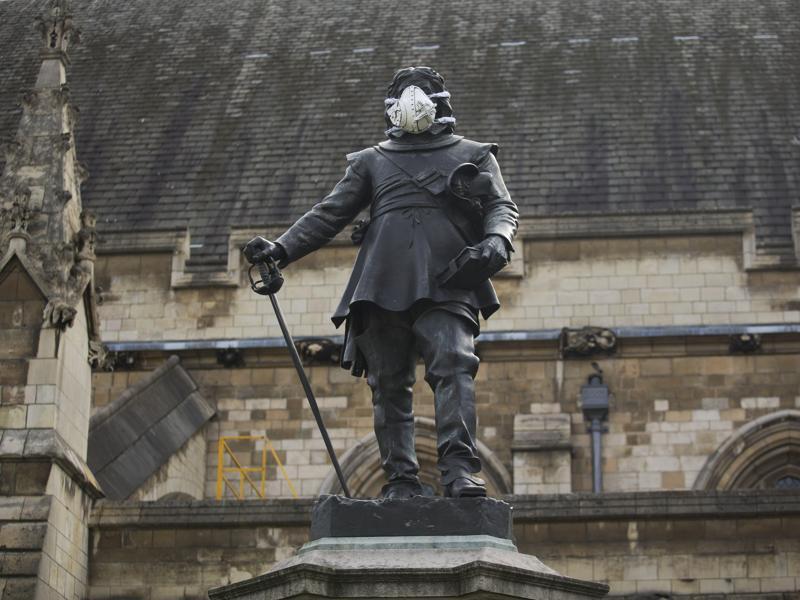 Anti-pollution groups cover London statues with masks | World News