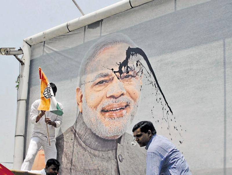 BJP files police complaint against defacement of Modi poster in Noida ...