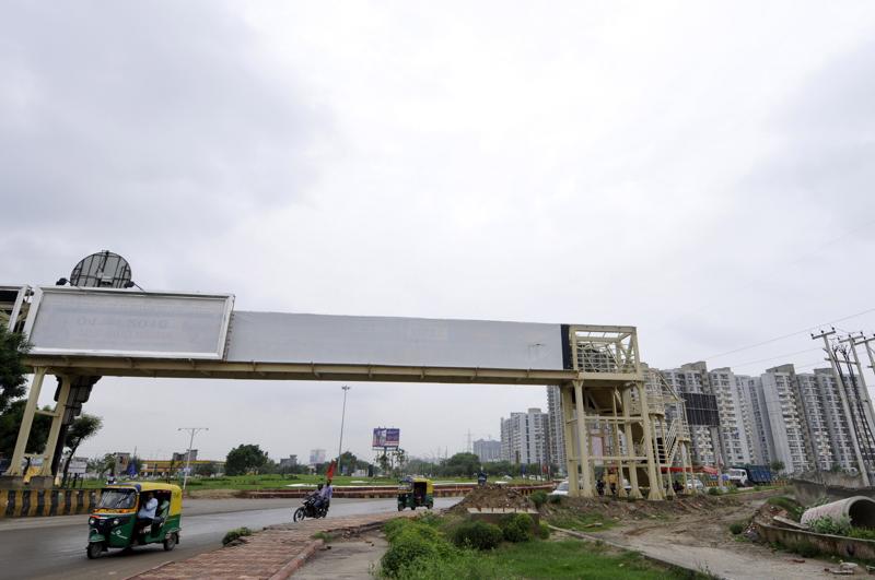 Noida: Sector 121 residents demand shifting of foot over bridge ...