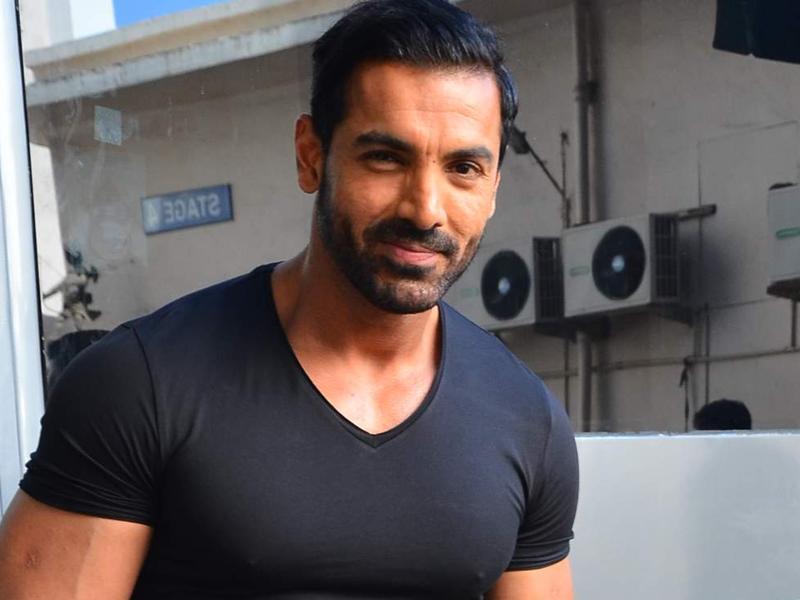 John Abraham is reading the news to prep for his next | Bollywood