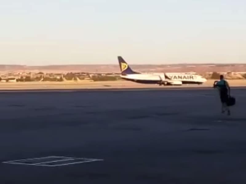 Watch: Man breaks through fire escape, chases flight on tarmac, gets on ...