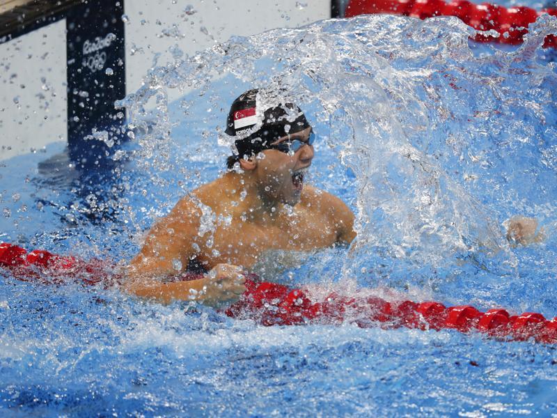 Schooling beats idol Phelps to win 100m butterfly with an Olympic ...