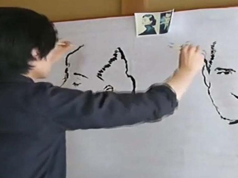 Watch | Japanese artist paints two portraits at once | Hindustan Times