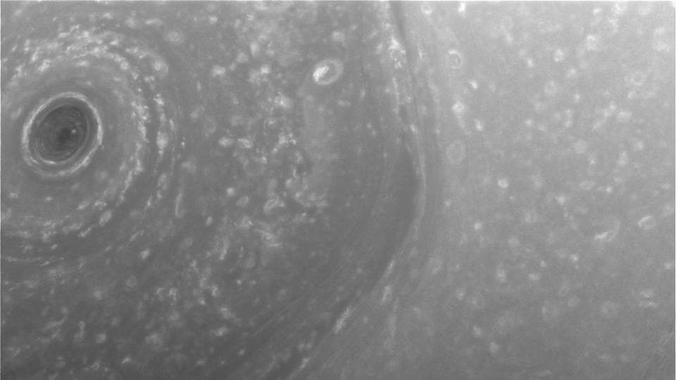 NASA Saturn probe beams back first images from new orbit | World News ...