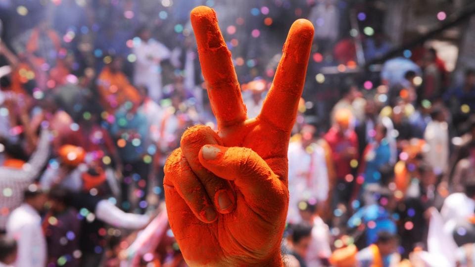 In a party mood: BJP, Congress celebrate UP, Punjab victories ...