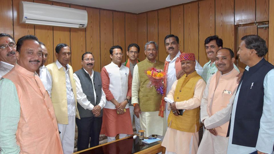 Uttarakhand CM Trivendra Rawat distributes portfolios; keeps home ...
