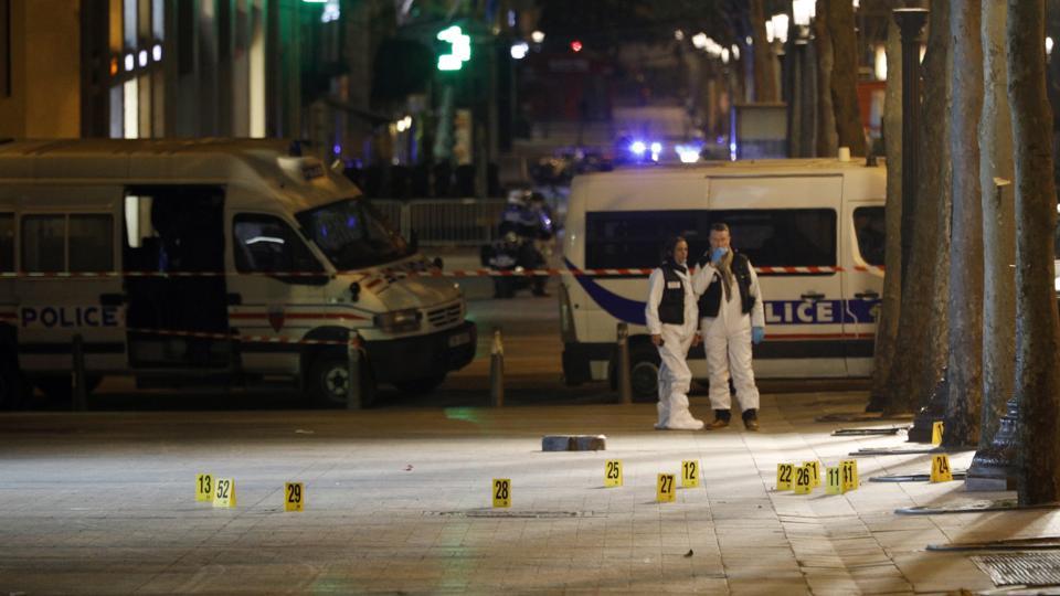 Paris police shot on Champs-Elysees; Islamic State claims attack ...