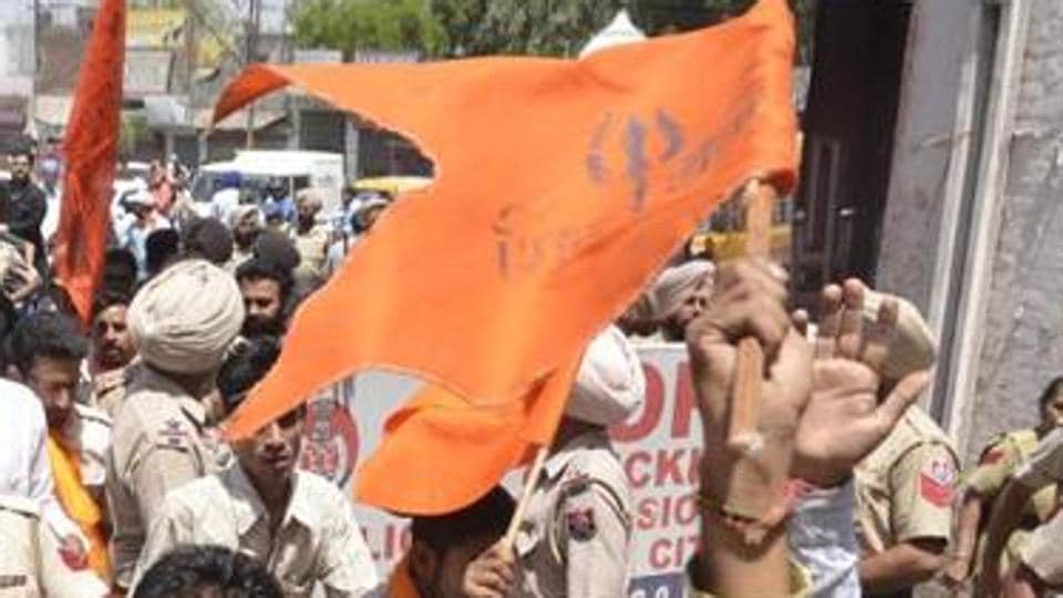 Shiv Sena activists burn Pakistan flag in Punjab, protest terror ...