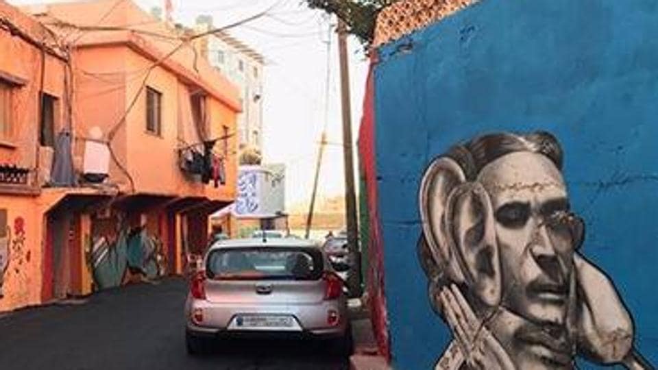 Colourful street art completely changes a dull, rundown suburb in ...