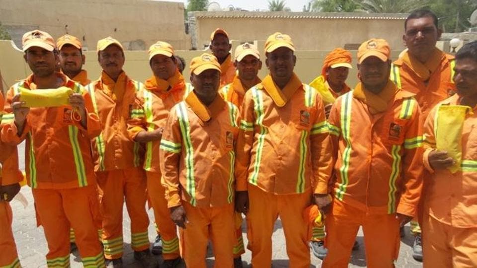 Dubai street cleaners beat the heat with cooling collars | World News
