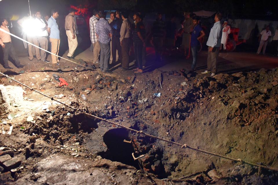 Noida authority has four machines to clean drains, yet it uses humans ...