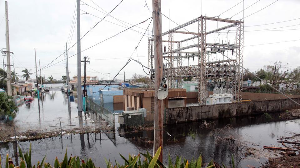 Hurricane Maria effect: 70,000 told to evacuate as dam fails in Puerto ...